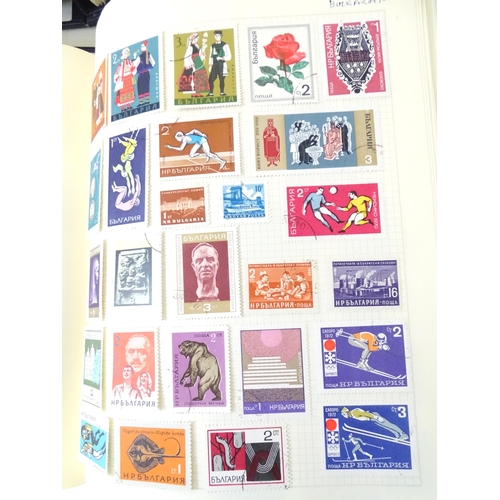 A quantity of 19th and 20thC postage stamps affixed within five albums ...