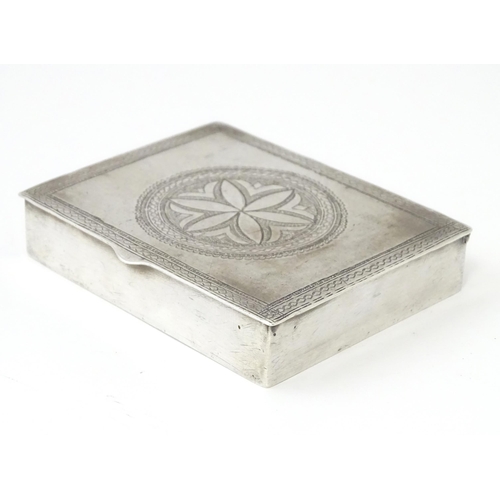 A white metal box with hinged lid. Approx. 3 1/4" wide