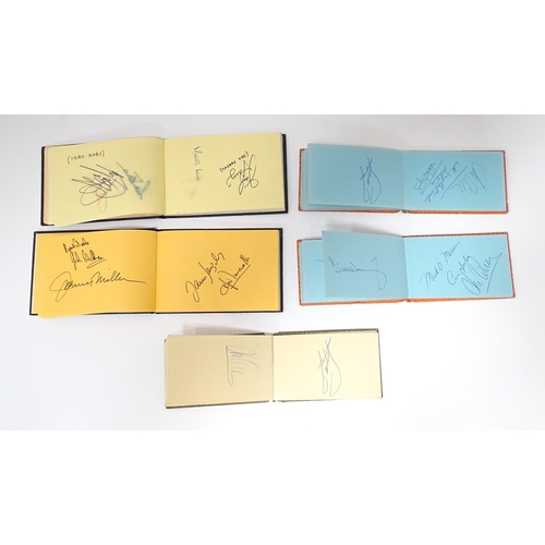 A quantity of golf autograph albums containing various golfer ...