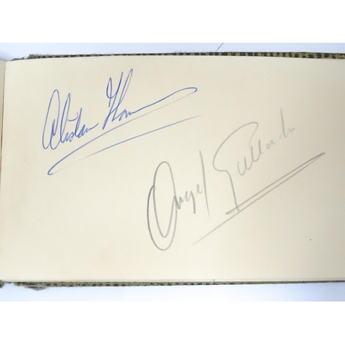 A quantity of golf autograph albums containing various golfer ...
