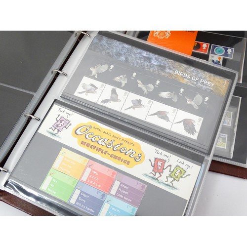Eight Royal Mail presentation folders containing various mint stamps to ...