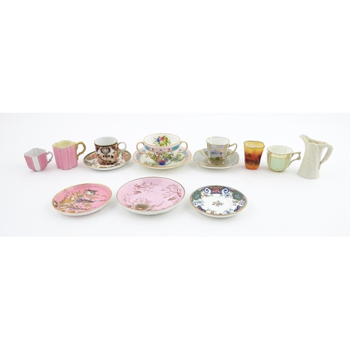 A quantity of assorted tea cups and saucers, to include examples with ...