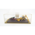 Toys: A JCB die cast scale model Fifty Year commemorative JCB 4CX and ...