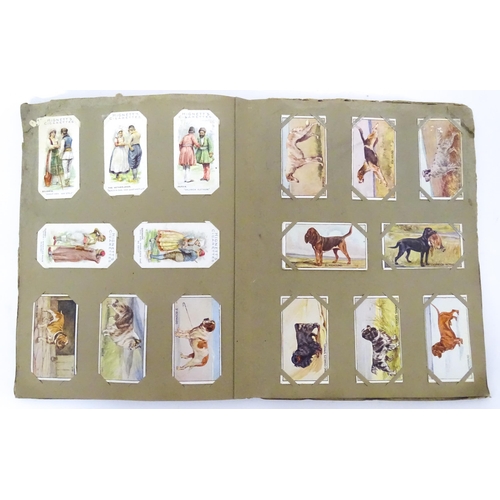 A quantity of British and worldwide postage stamps within albums ...