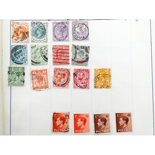 A quantity of British and worldwide postage stamps within albums ...