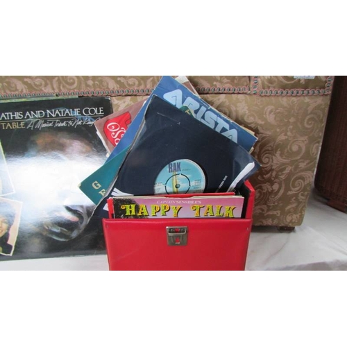 A good lot of 33 and 45 rpm records including a Johnnie Mathis collection.