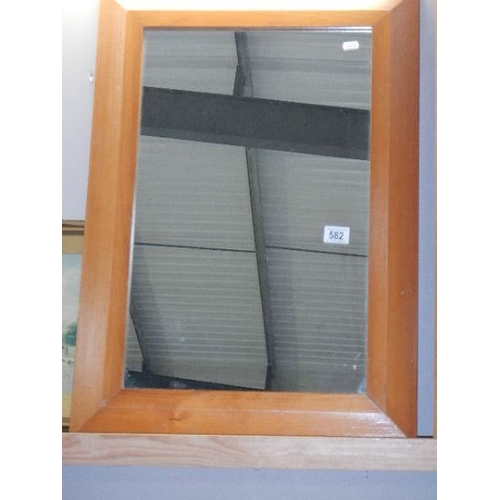 A pine framed mirror. (collect only)