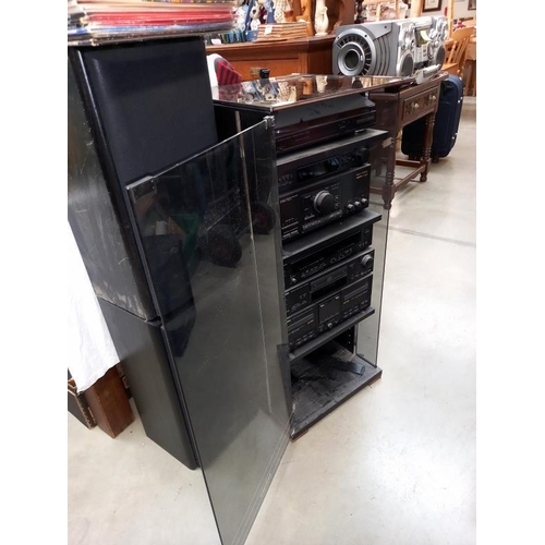 A Technics tower Hi-Fi including cabinet on wheels (lid needs fixing ...