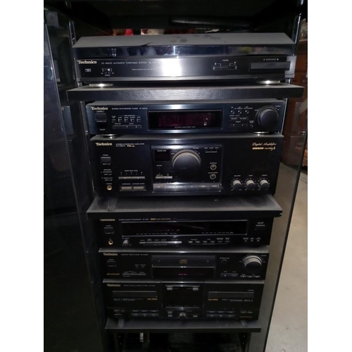 A Technics tower Hi-Fi including cabinet on wheels (lid needs fixing ...