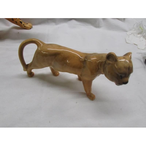 Two Beswick leopards, 8" and 6".