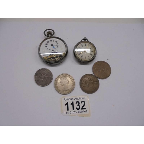 A lady's silver fob watch, a pocket watch and four coins.