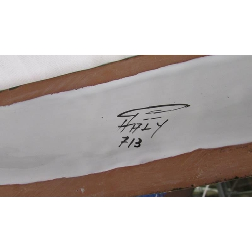 An Italian ceramic male and female figures on bicycle and penny ...