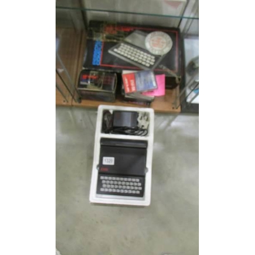 A vintage Sinclair ZX81 eith 16k ram and a quantity of games.