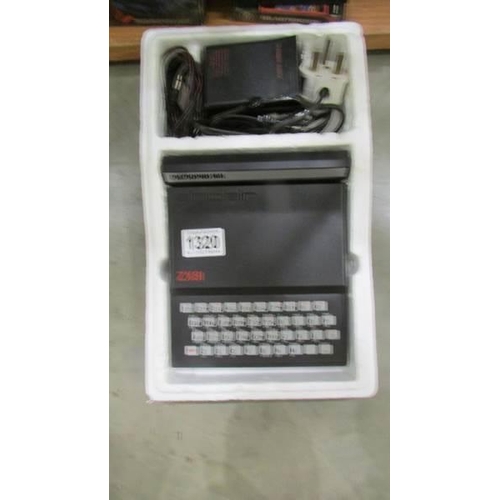 A vintage Sinclair ZX81 eith 16k ram and a quantity of games.