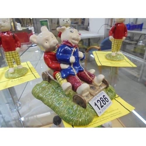 A royal Doulton Rupert Bear & Algy Pug go racing , 2 Rupert with ...