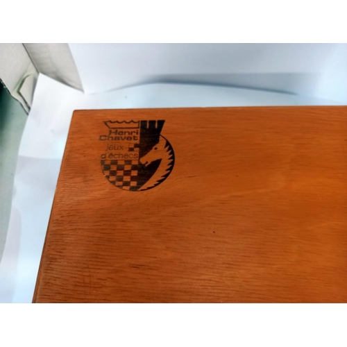 A boxed set of Henri Chavet Chess Set - J'eux D'Echecs