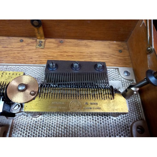 A Victorian symphonium with 10 discs, in good working order. COLLECT ONLY