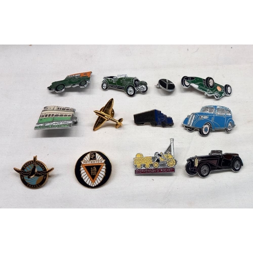 A good lot of mostly enamel transport pin badges including cars, ships ...