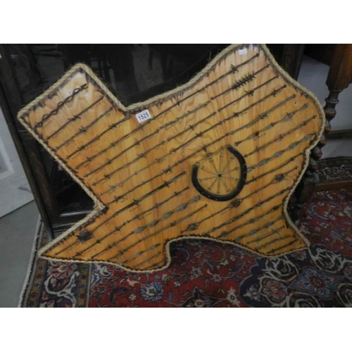 An unusual wall display of rare barbed wire samples, COLLECT ONLY.