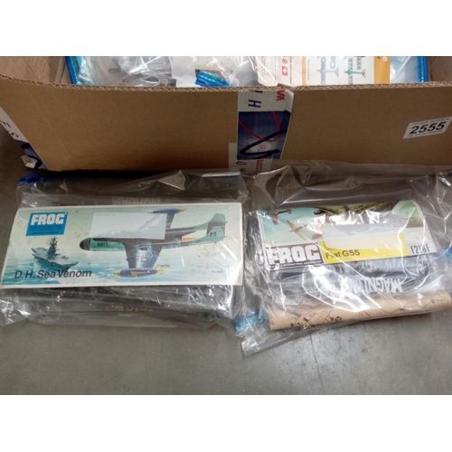 A box of model aircraft kits
