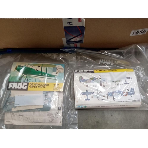 A box of model aircraft kits