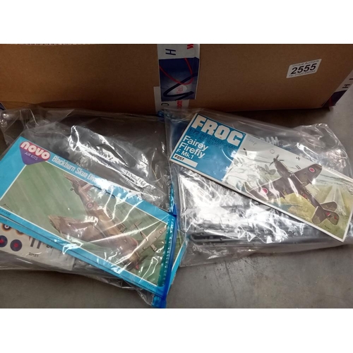 A box of model aircraft kits