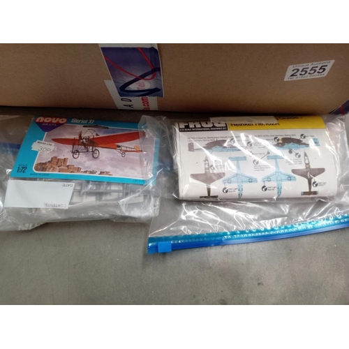 A box of model aircraft kits