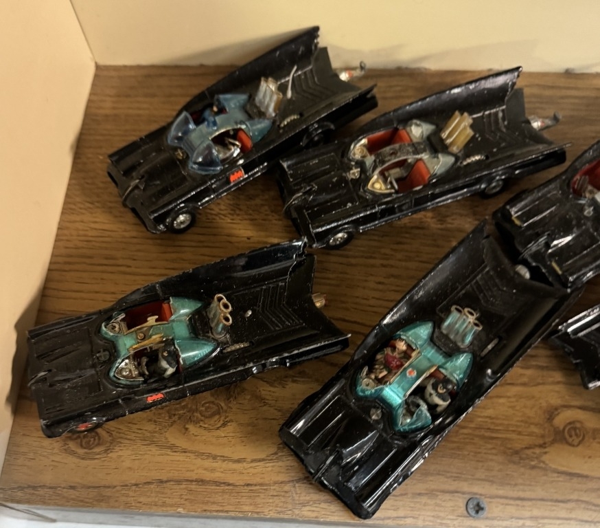 A quantity of Corgi Batmobiles including Bat bike, Spiderman bike ...