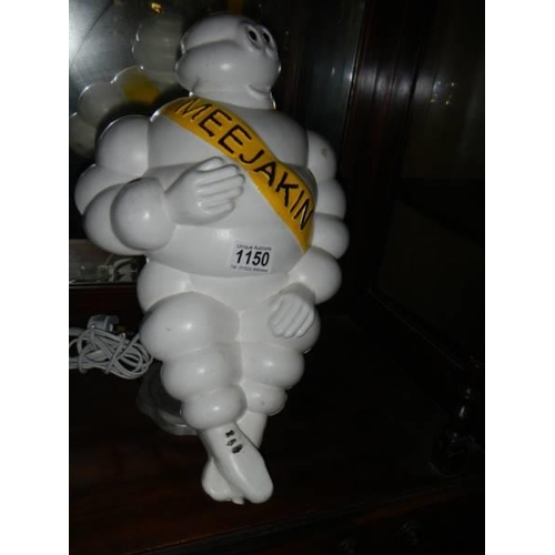 A vintage Michelin Man truck light mascot with Finnish branded sash ...