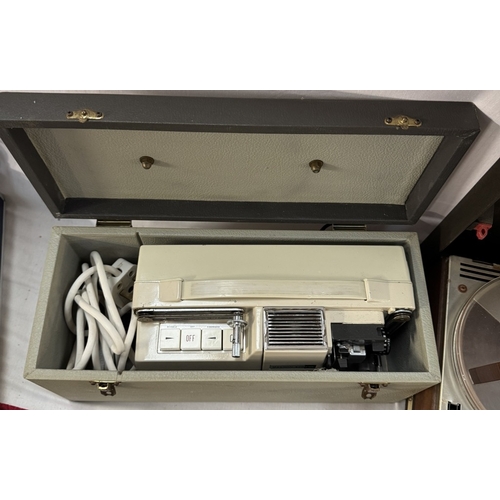 A Telefunken reel-to-reel tape recorder & a film projector