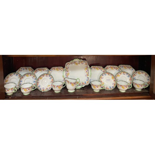 A 21 piece Paragon tea set (Bottom Shelf)