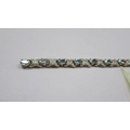 A stone set silver gilt bracelet.