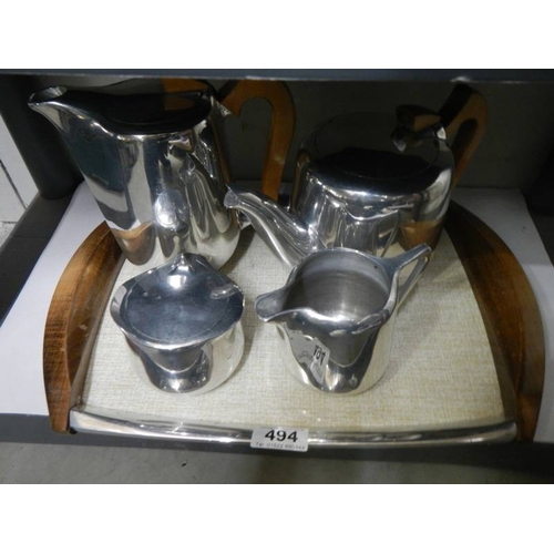 A retro Picquot ware four piece tea set on tray.