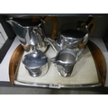 A retro Picquot ware four piece tea set on tray.
