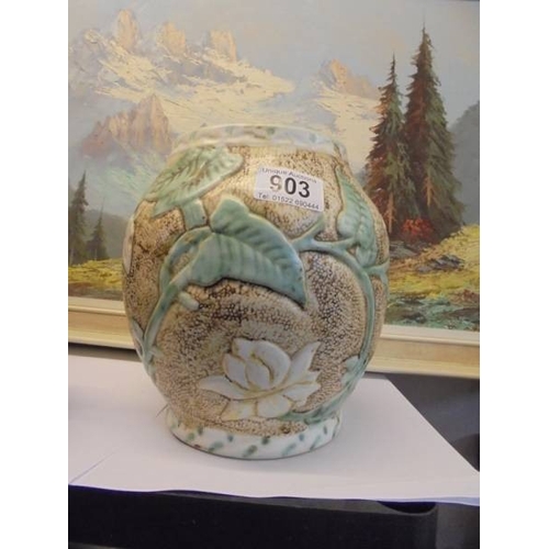 A Denby vase.