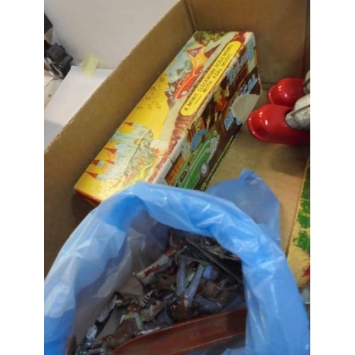 An Astro Scout clockwork robot, a Triang empty box, lead Indians etc.