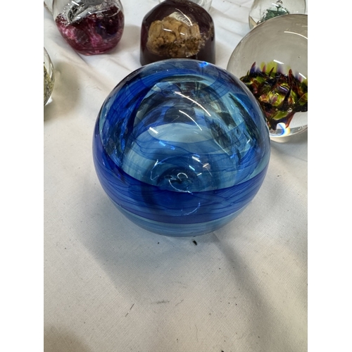 A quantity of art glass paperweights including 1 marked Jane Charles