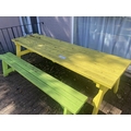 An extra-long garden bench. An extra-long garden table and two benches.