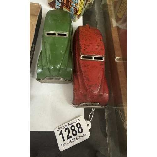 2 Tri-ang clockwork tinplate cars and a Minic musical car empty box