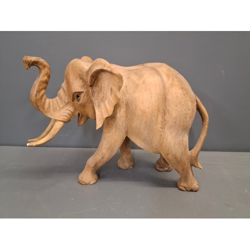 A white & Purple glass vase 30cm high & a wooden elephant