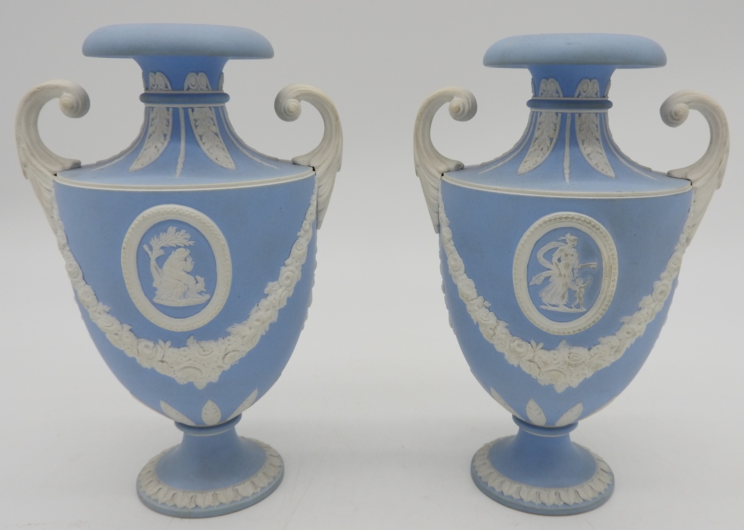 A PAIR OF WEDGWOOD JASPER WARE VASES of Amphora form with applied ...