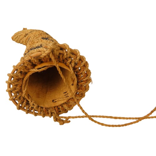 A WOVEN PHALLOCRYPT, GOROKA, made of vine fibre with painted pigment ...