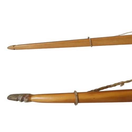 A YEW WOOD ENGLISH LONGBOW, another long bow and assorted arrows. 20th ...