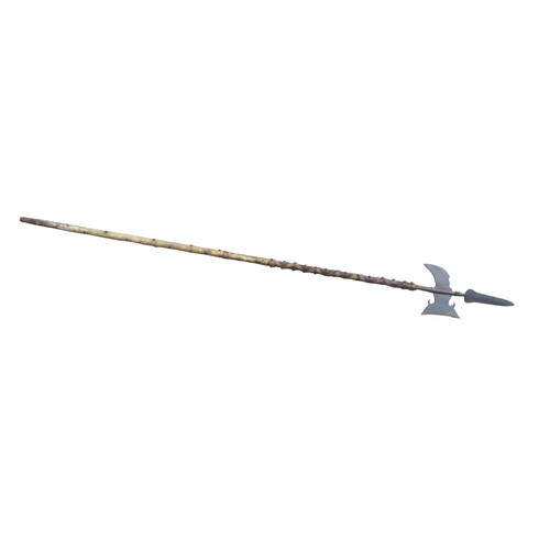 A HALBERD, German, 17th century style, the shaped front blade with ...