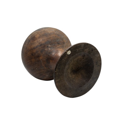 AN INDONESIAN, CELEBES CIRCULAR WOODEN BOWL of waisted form, with ...