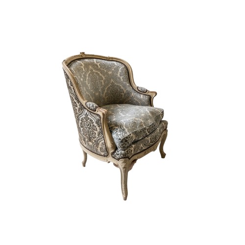FRENCH LOUIS XVI STYLE FAUTEIL EARLY 20TH CENTURYCovered in a sage and ...