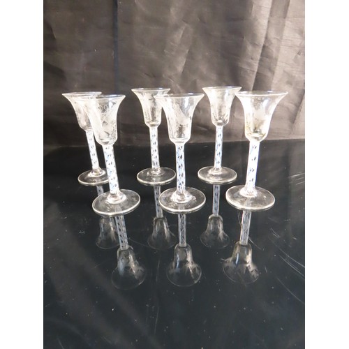 A SET OF SIX 18TH CENTURY STYLE LIQUER GLASSES with engraved bowls and ...