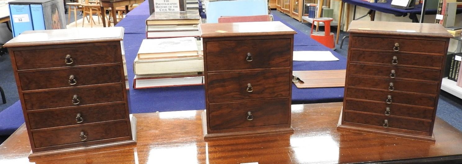 Set of three modern walnut veneered collectors' chests, attributed to ...