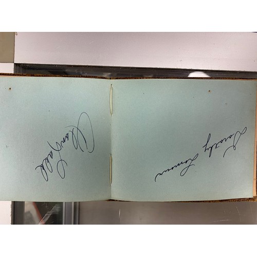 Showbiz Interest: autograph book containing the signatures of Alan Ladd ...
