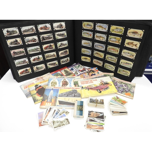 Comprehensive cigarette card album including full sets of cards, namely ...